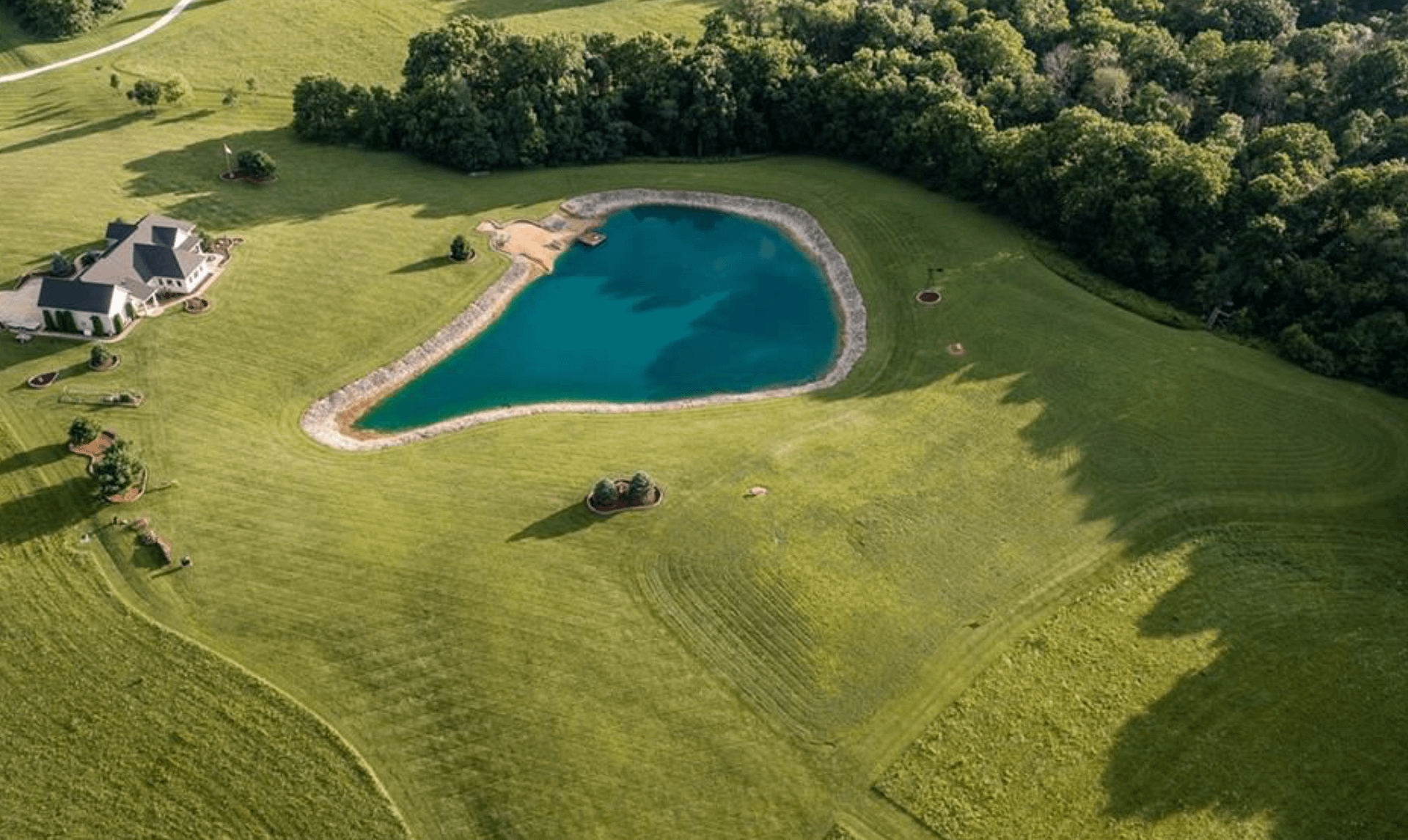 Brick Home On 17 Acres With Pond (PHOTOS)