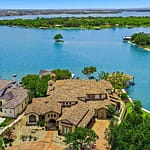 Lakefront Texas Home With Lazy River Pool & Boat House - Homes of the Rich
