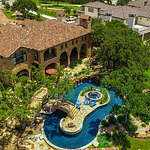Lakefront Texas Home With Lazy River Pool & Boat House - Homes of the Rich