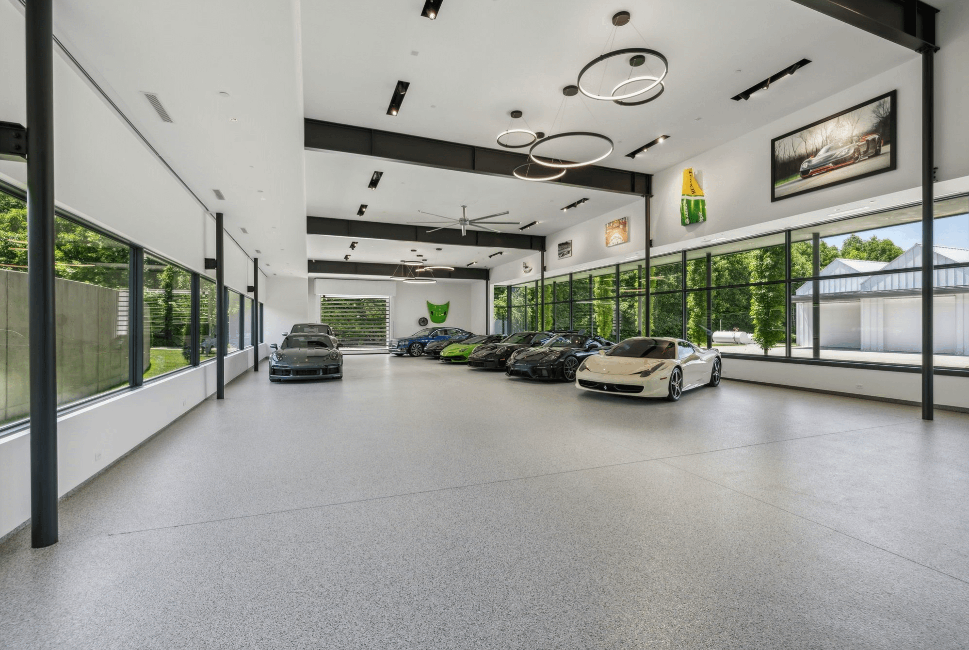 80 Acre Estate With Modern Farmhouse And Showroom Garage