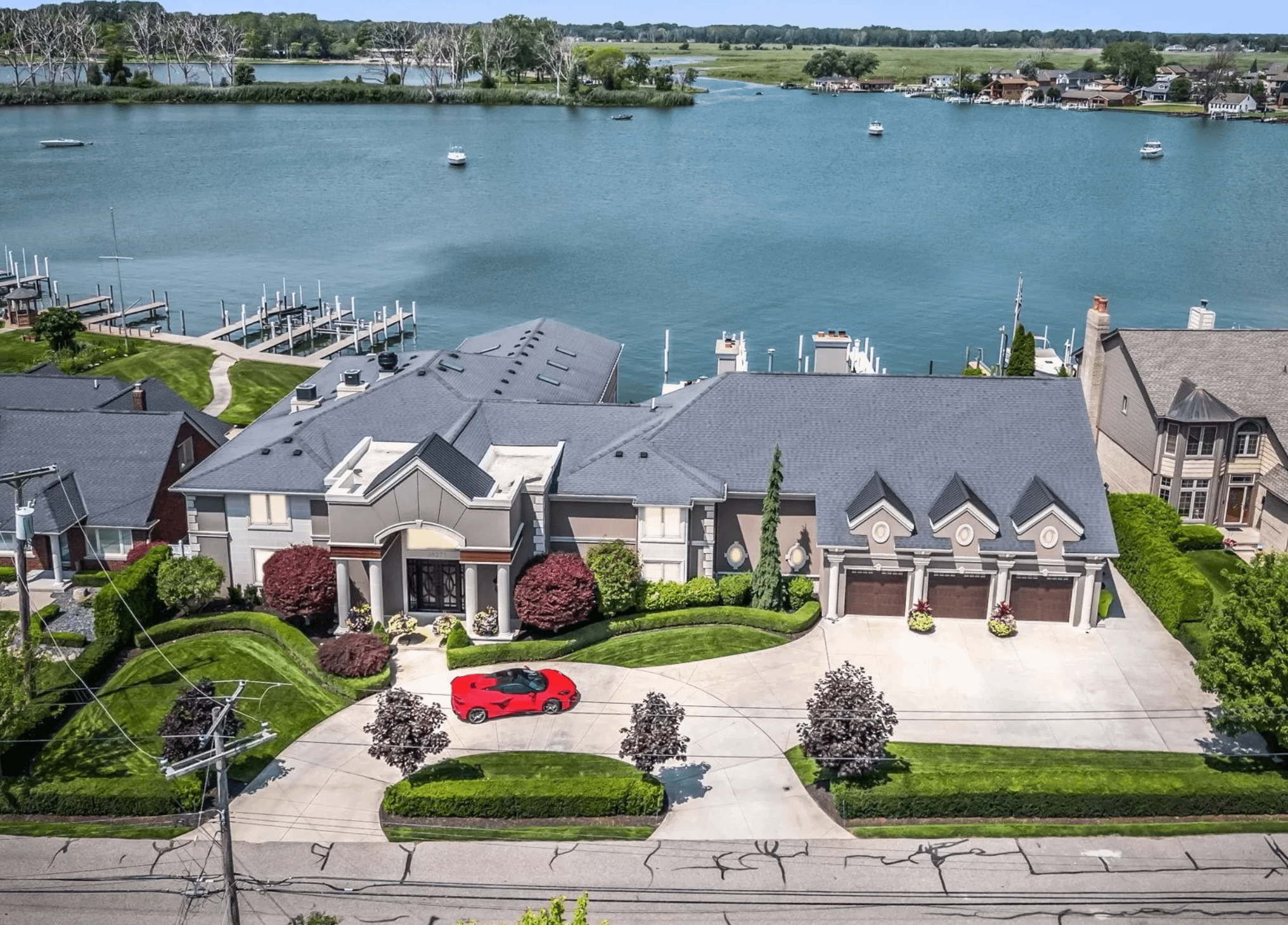 Michigan Waterfront Home Comes With An Attached Boathouse