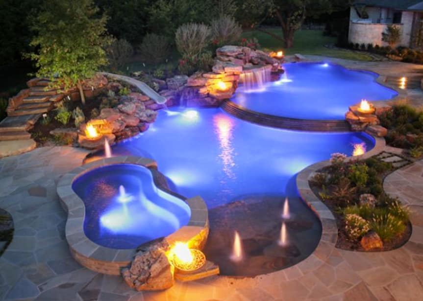 10 Swimming Pools With Cool Fire Features - Homes of the Rich