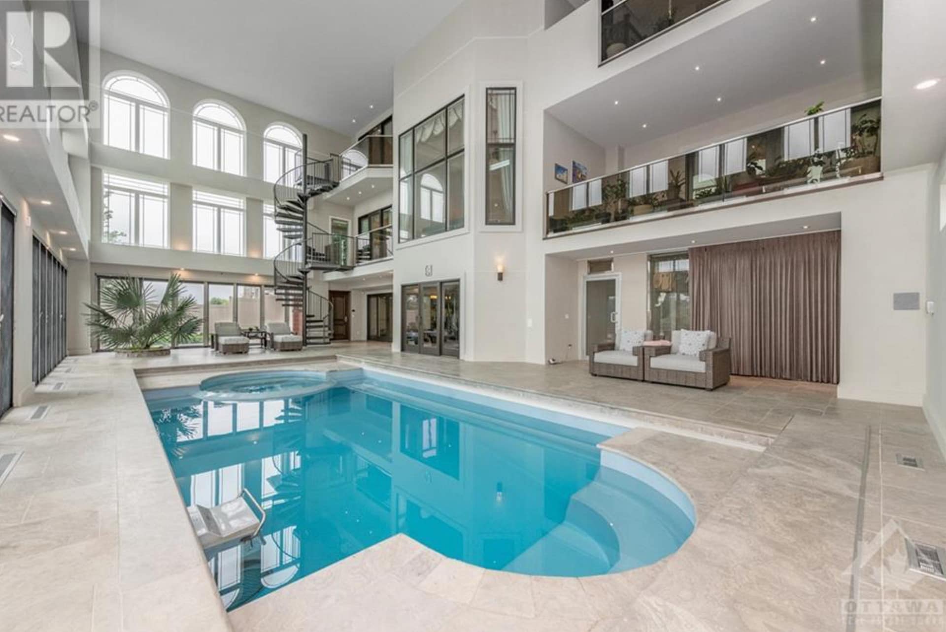 Riverfront Home In Ontario, Canada With 3-Story Indoor Pool (PHOTOS)