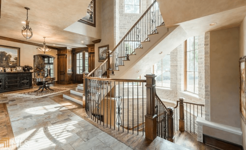 Lakefront Limestone Home In Suwanee, Georgia - Homes of the Rich