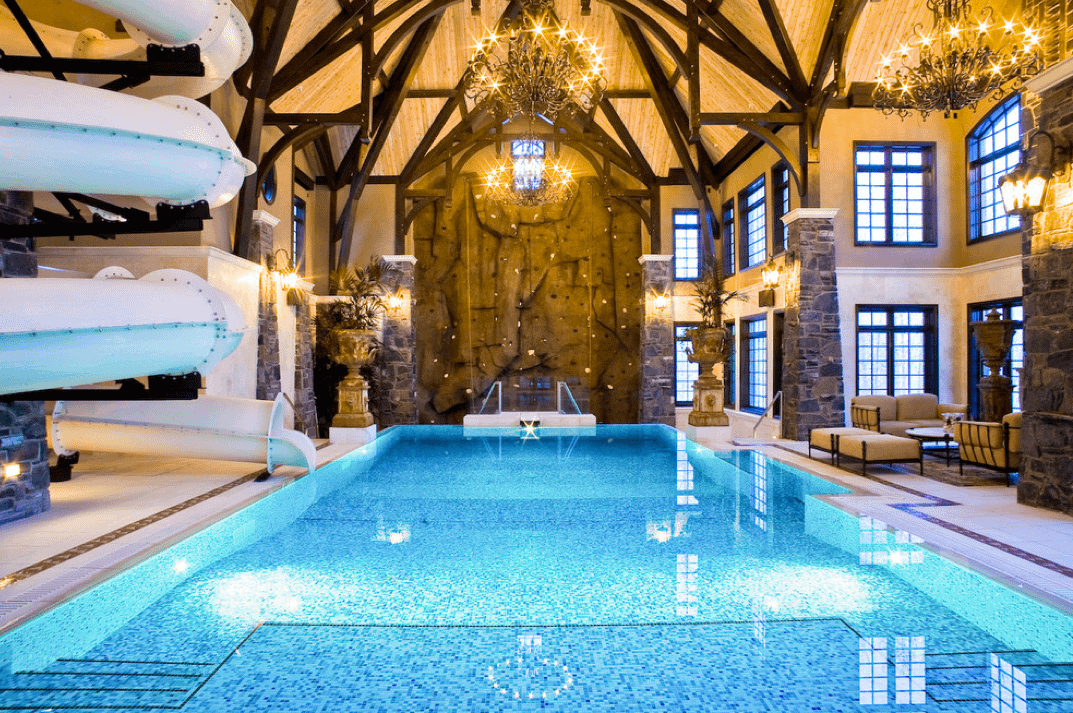 Amazing 3-Story Indoor Swimming Pool With Water Slide & Rock Climbing ...