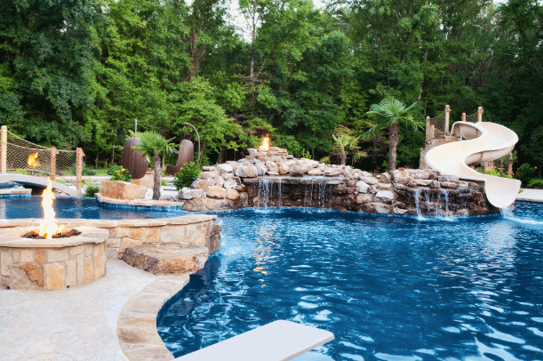 10 Pools With Slides Perfect For Summer - Homes of the Rich
