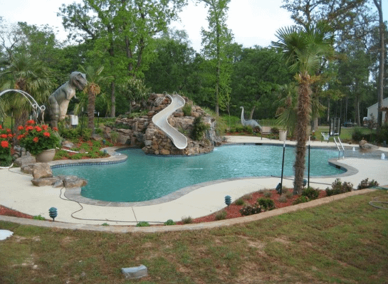 10 Pools With Slides Perfect For Summer - Homes of the Rich